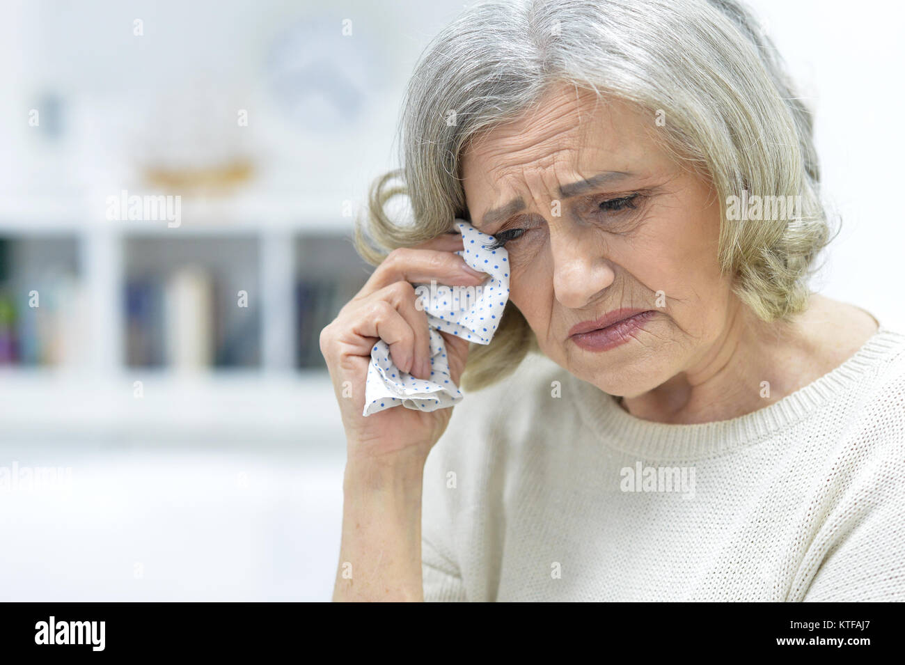 Portrait of a crying elderly woman close-up Stock Photo - Alamy