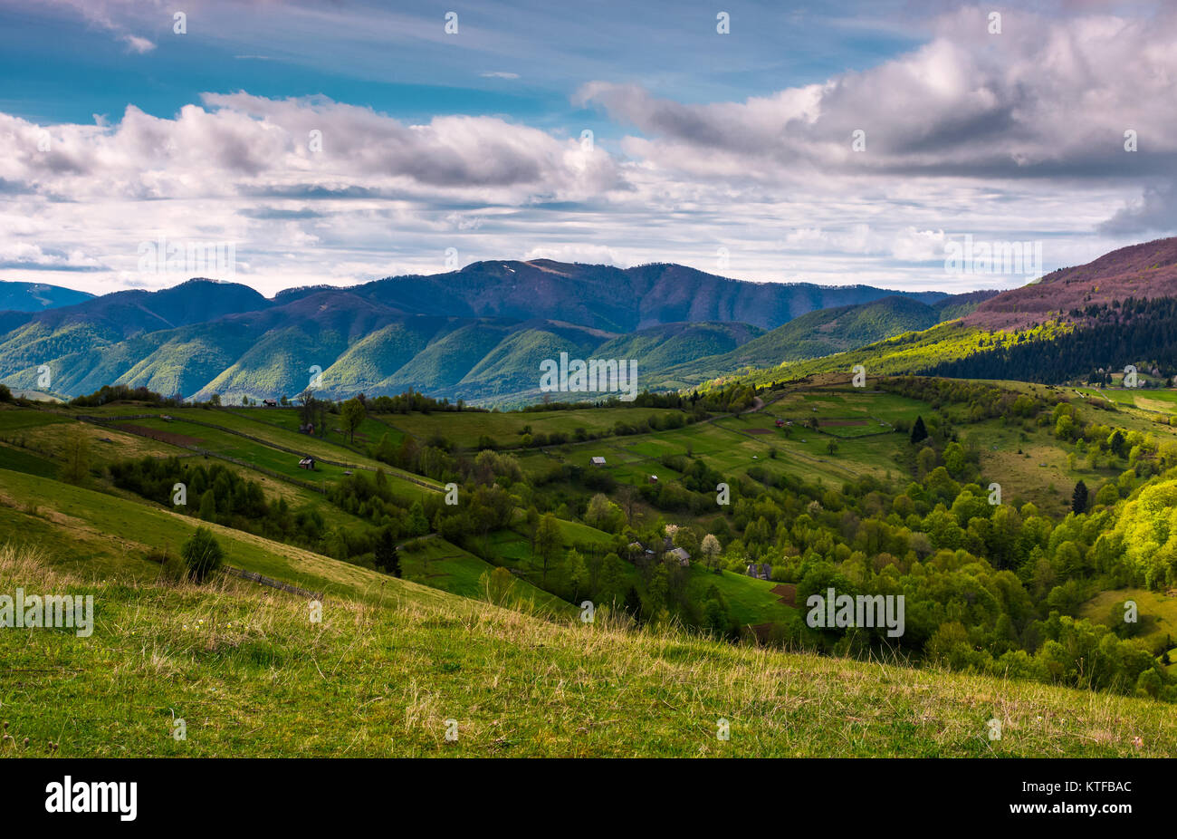 beautiful mountainous countryside in springtime. village outskirts with ...
