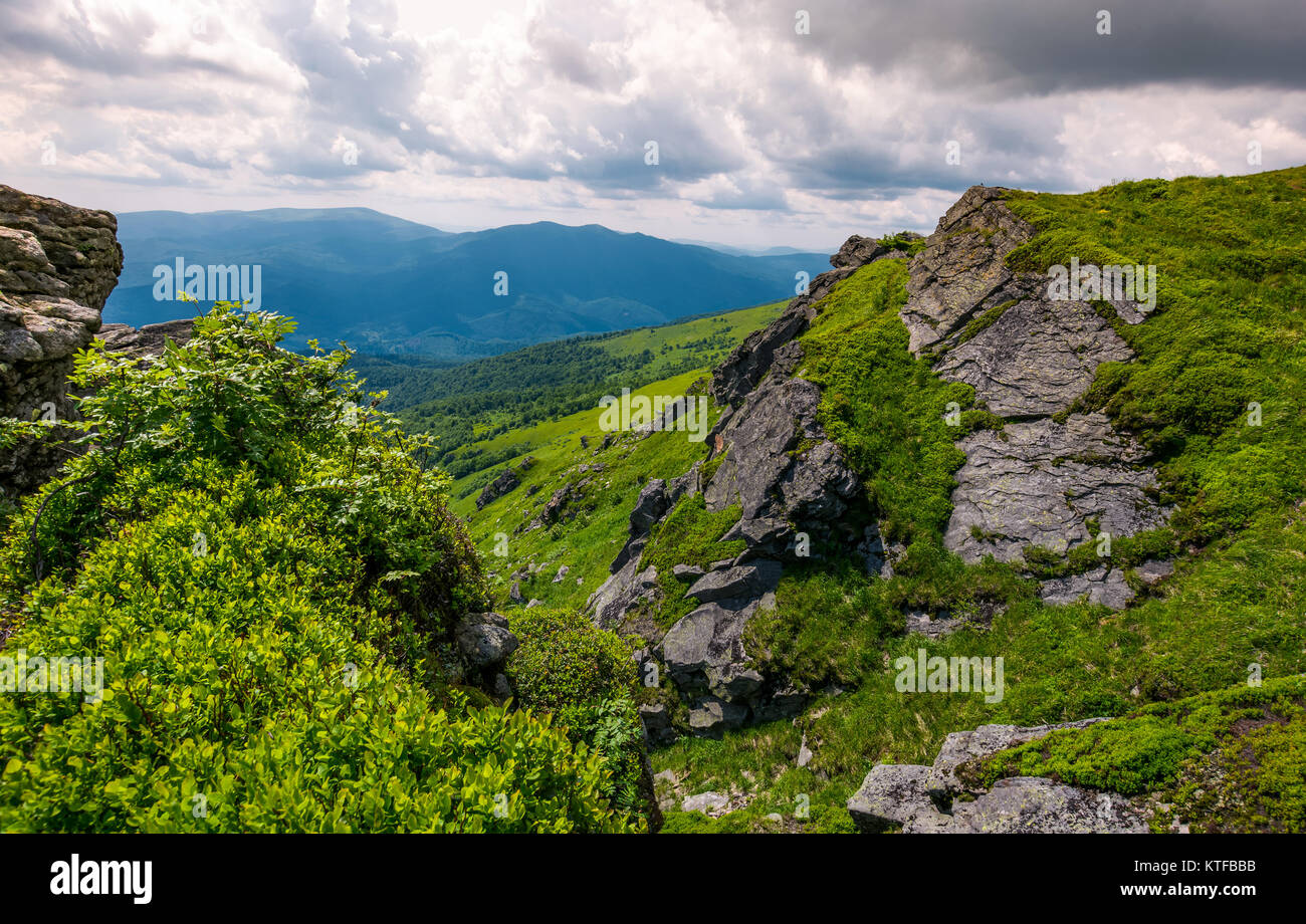 rocky cliff on the hillside edge. spectacular view of mountainous ...