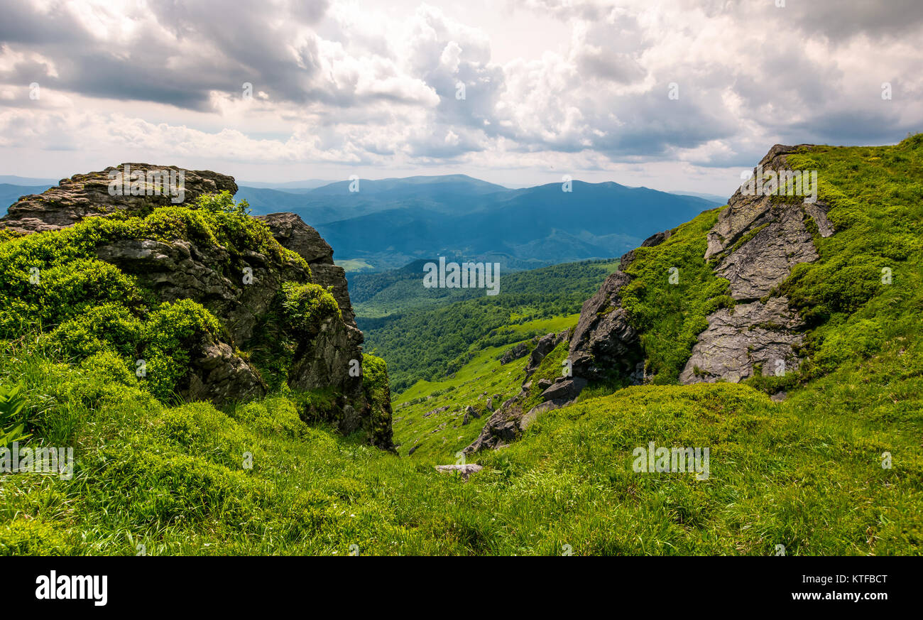 rocky cliff on the hillside edge. spectacular view of mountainous ...