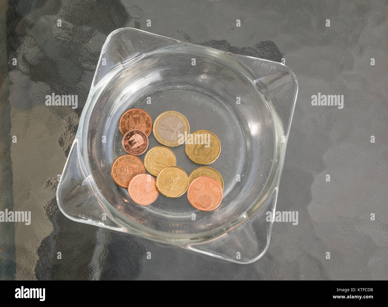 Tip glass euro coins hi-res stock photography and images - Alamy