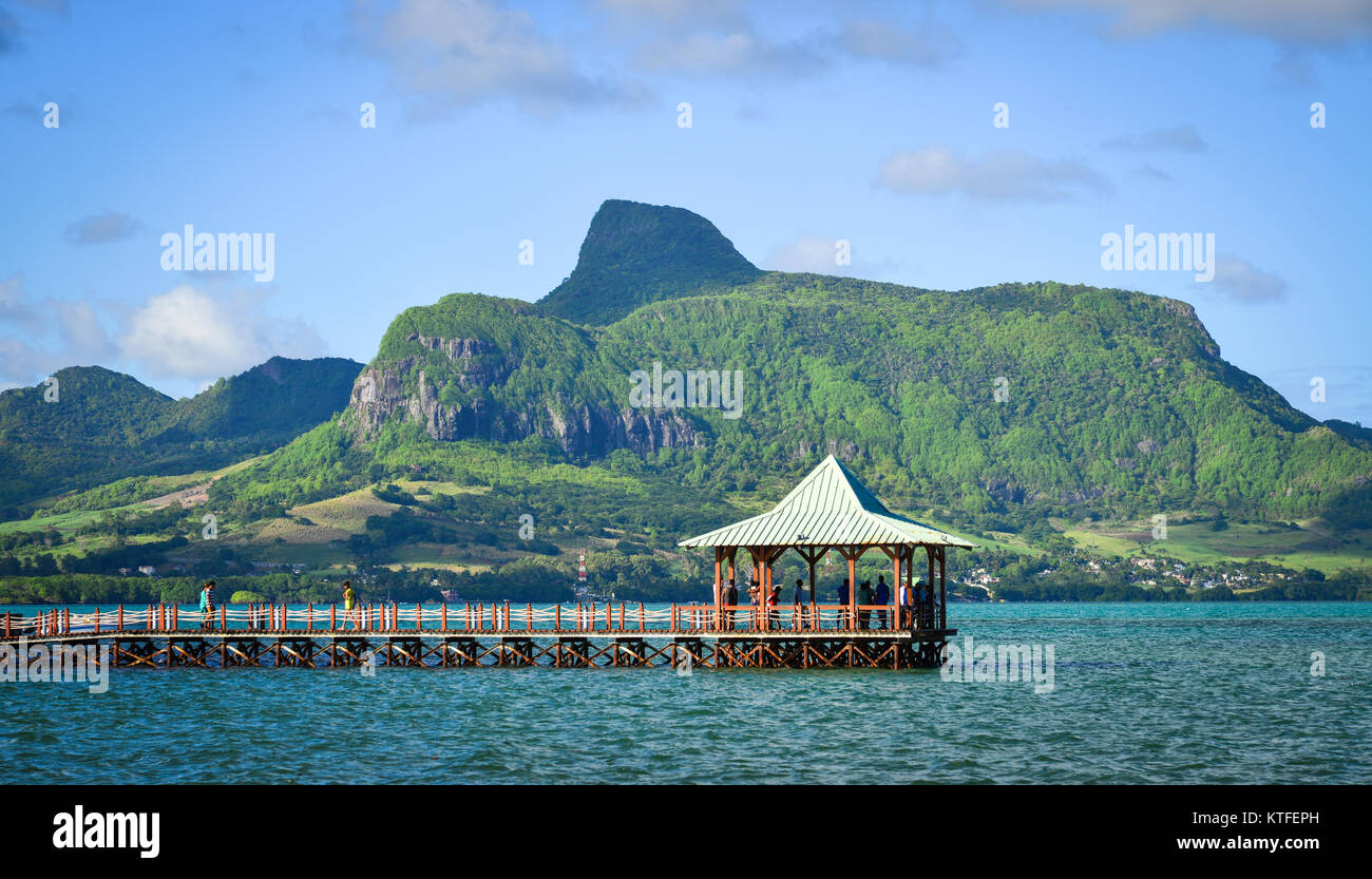 Mahebourg, Mauritius - Jan 3, 2017. People on the wooden bridge in ...