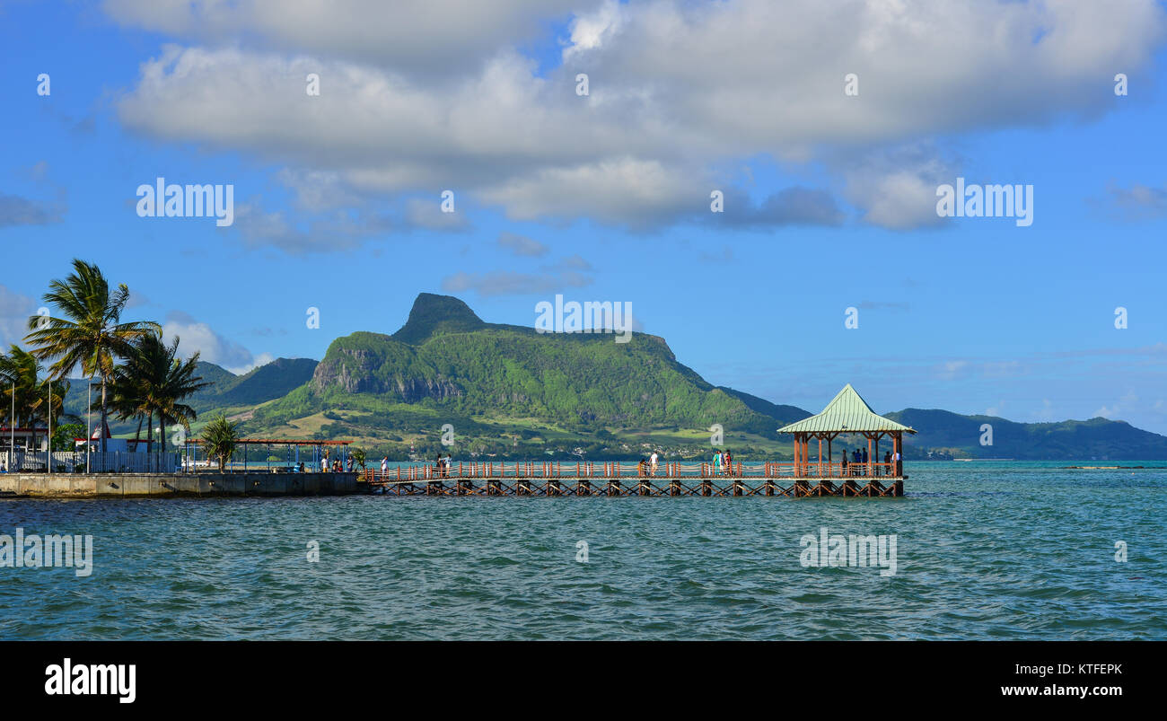 Mahebourg, Mauritius - Jan 3, 2017. People walk on the bridge in ...