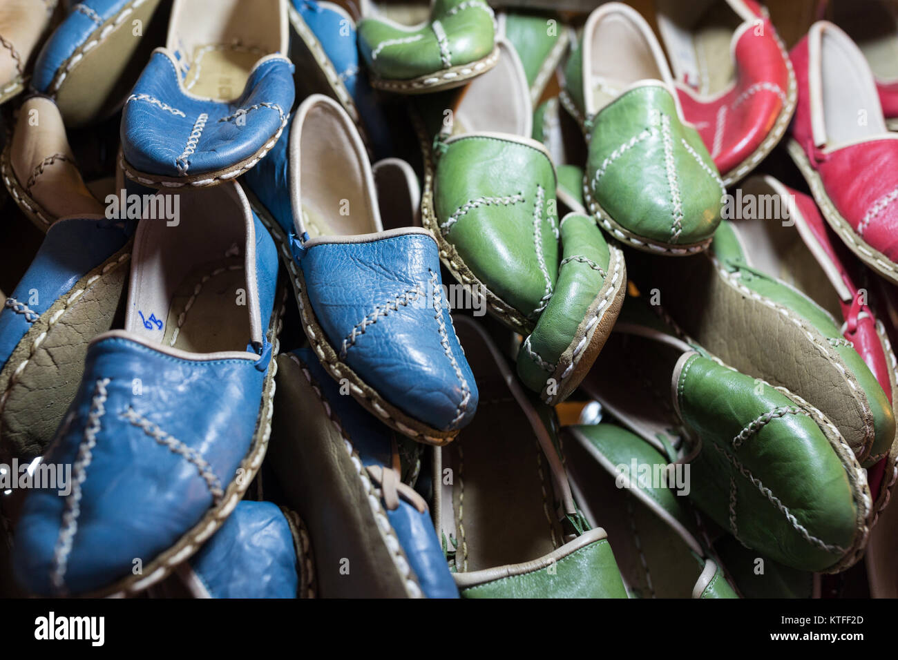 colorful hand made leather shoes for sale in a market Stock Photo - Alamy