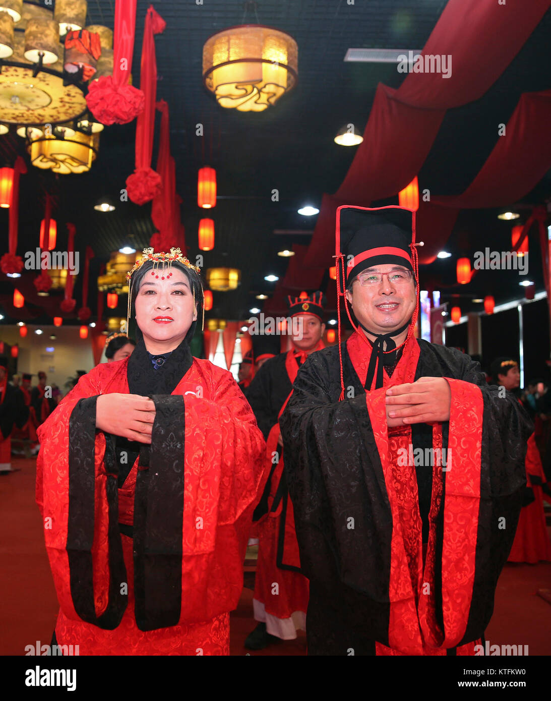 A couple wearing traditional wedding clothes hi-res stock photography ...