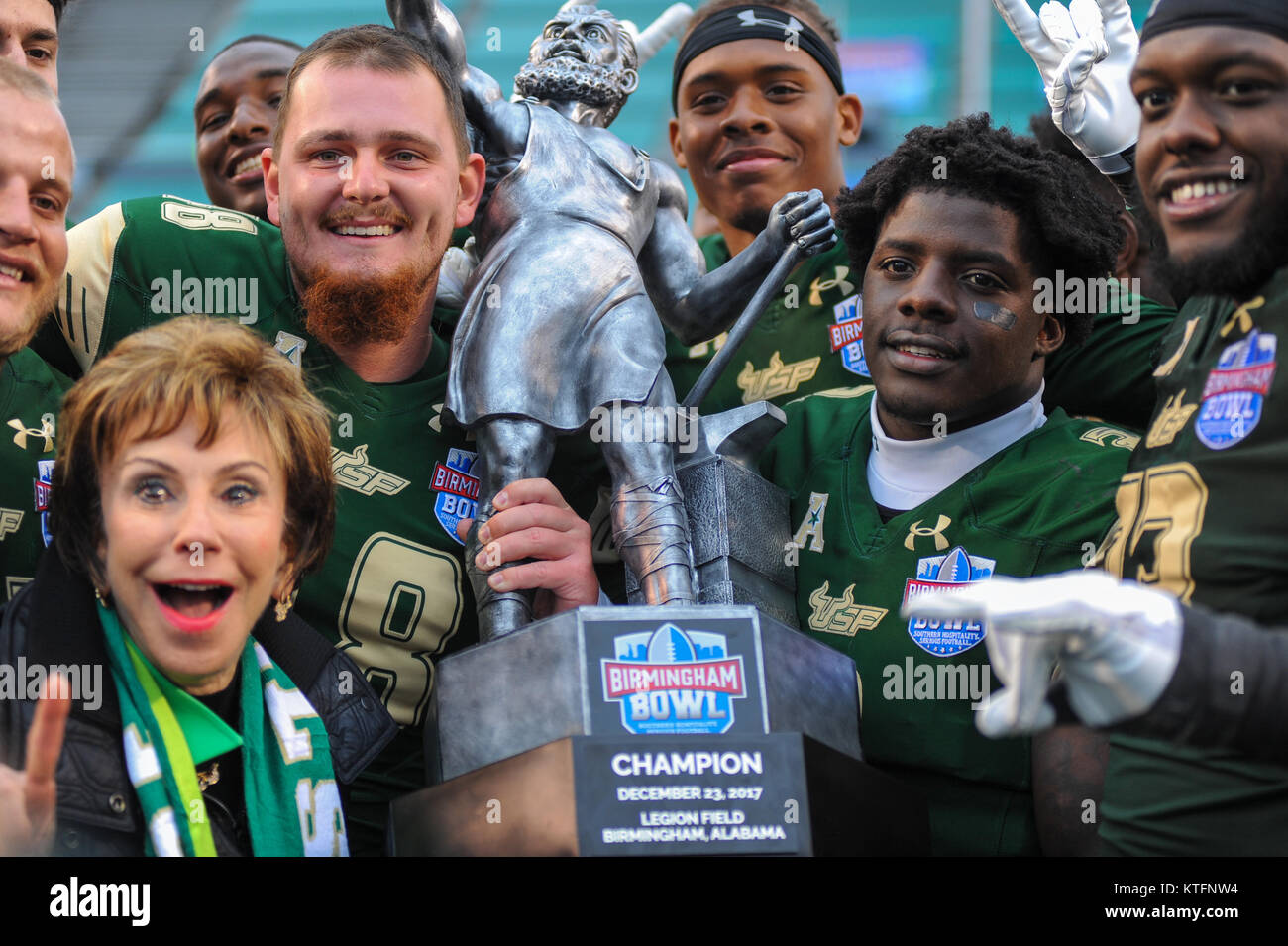 December 23, 2017; Birmingham, AL, USA; USF Bulls pose holding their ...