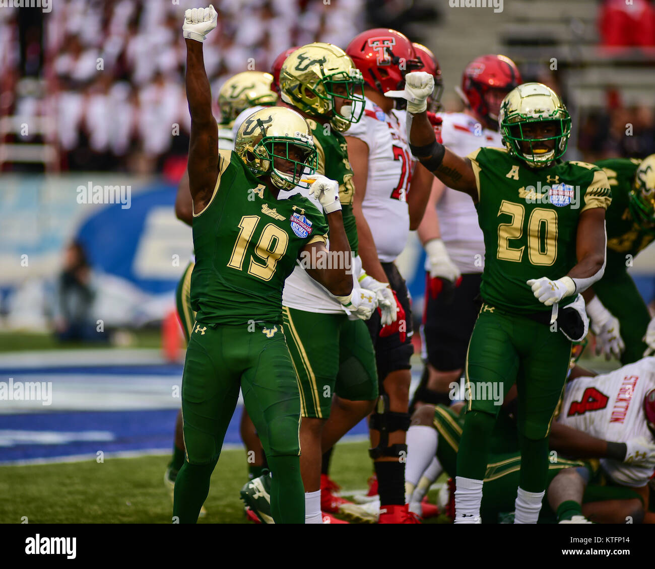 Legion Field. 23rd Dec, 2017. AL, USA; USF CB, RONNIE HOGGINS (19), and DEVIN ABRAHAM (20 ...