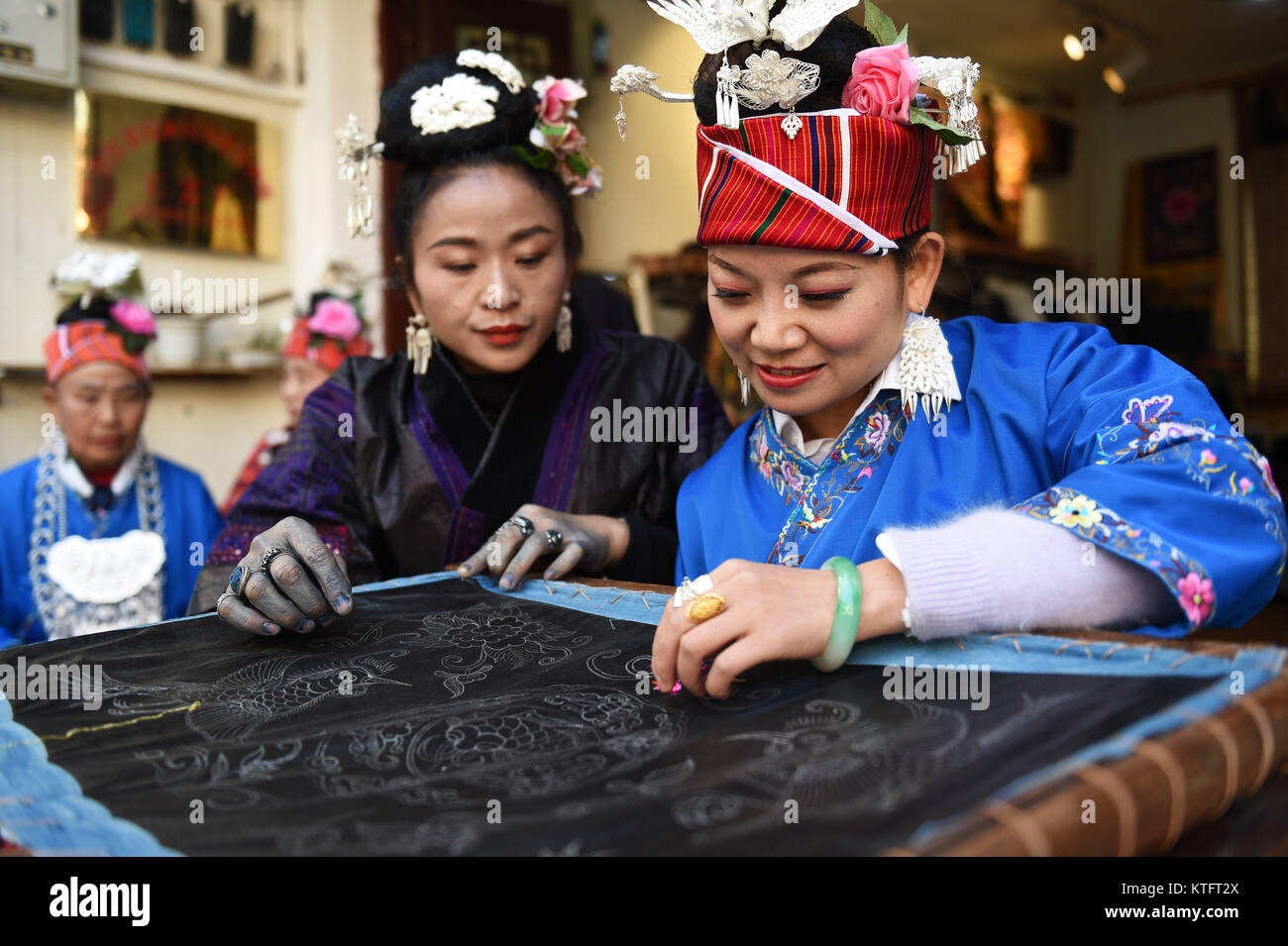 Taijiang, China's Guizhou Province. 24th Dec, 2017. Women make ...