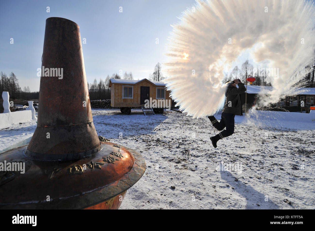Genhe, China's Inner Mongolia Autonomous Region. 24th Dec, 2017. A man ...