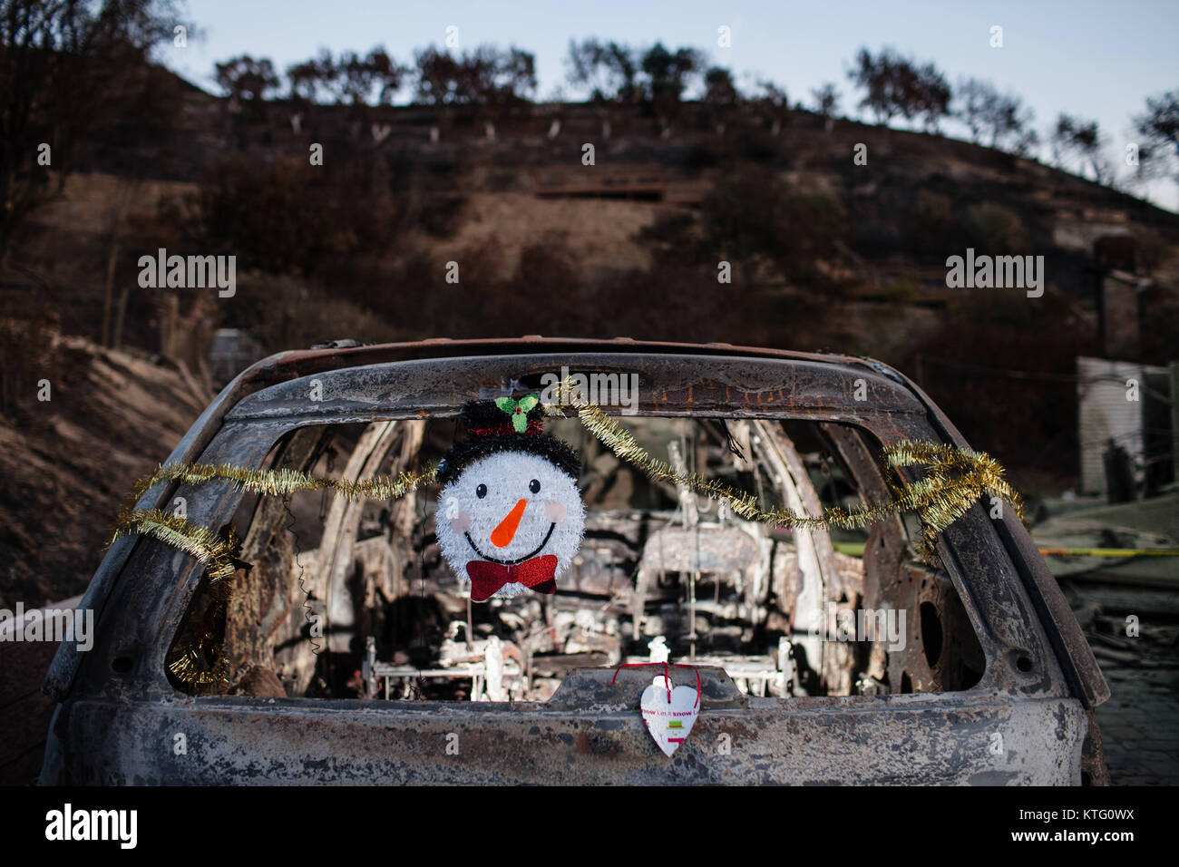 Ventura, California, USA. 25th Dec, 2017. A burnt car remains in a ...