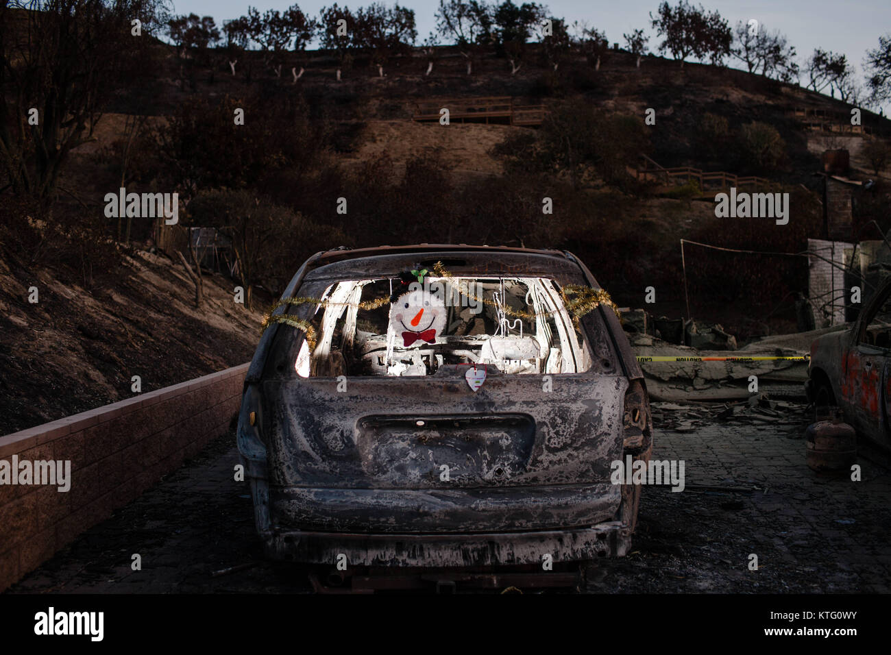 Ventura, California, USA. 25th Dec, 2017. A burnt car remains in a ...