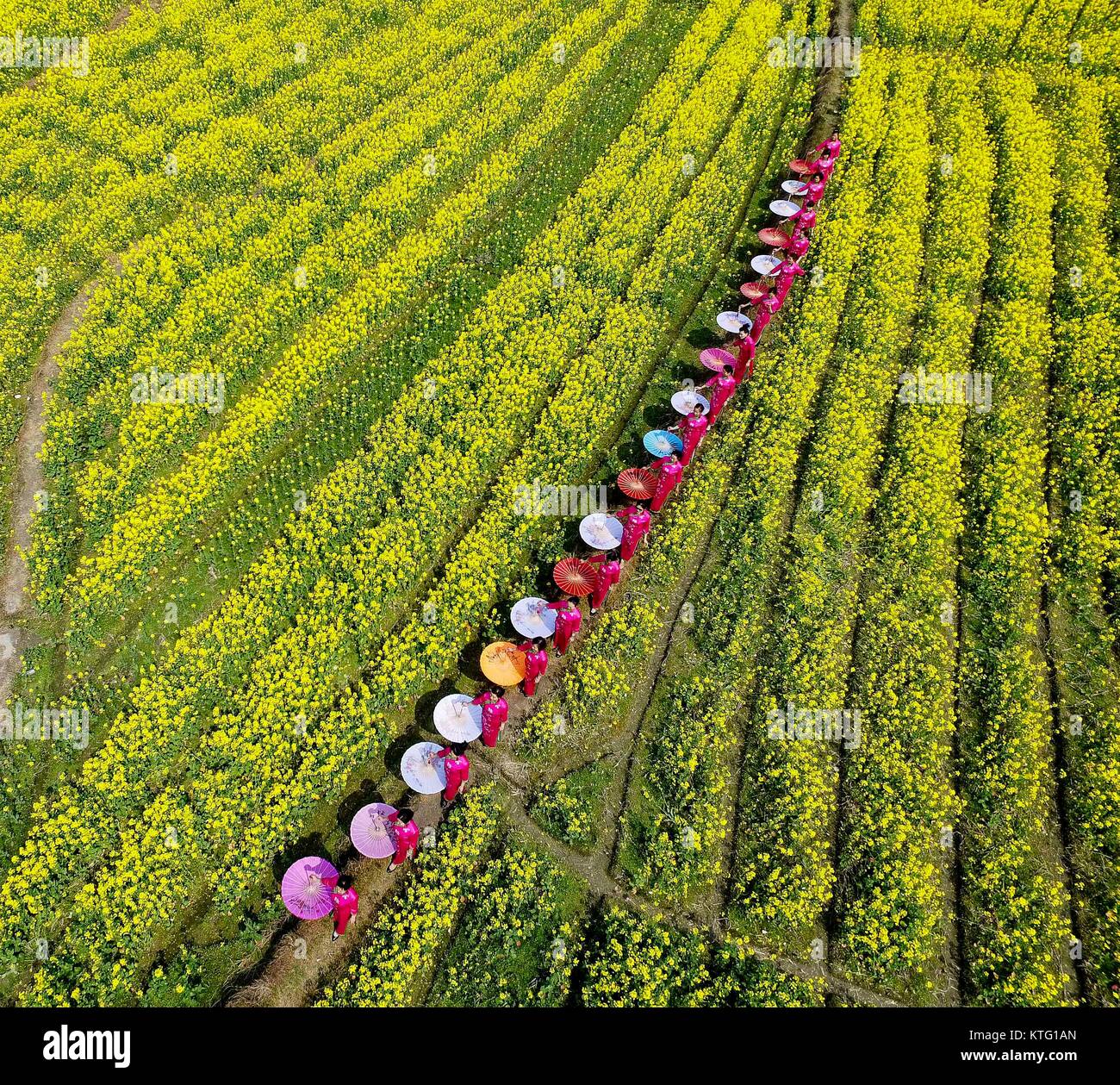 Beijing, China's Jiangxi Province. 8th Mar, 2017. Women present Qipao ...