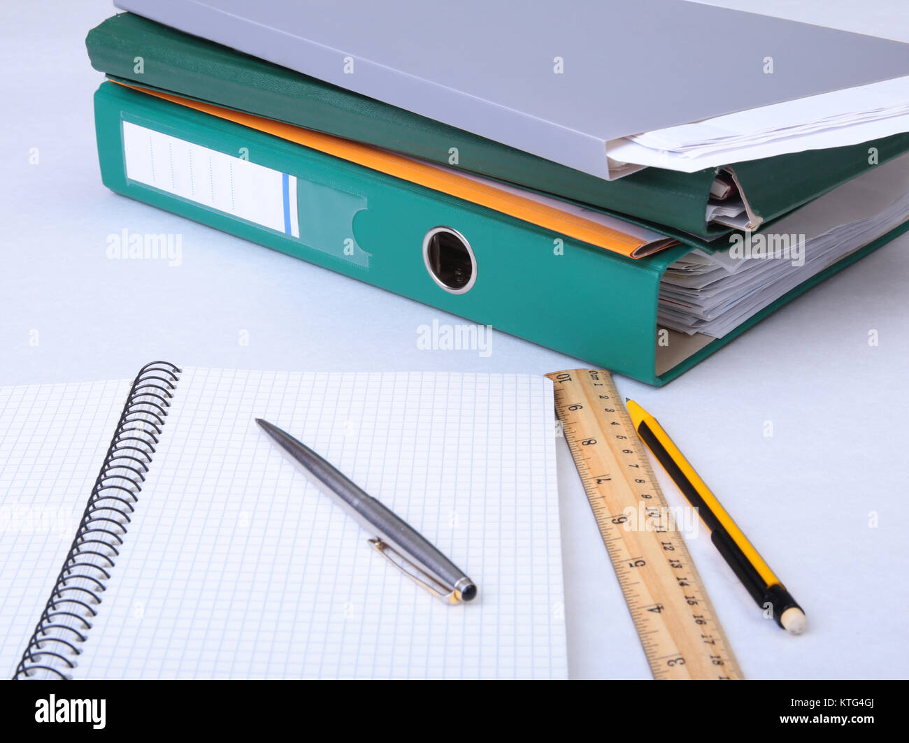 Folder file, note and pen on the desk. blurred background Stock Photo ...