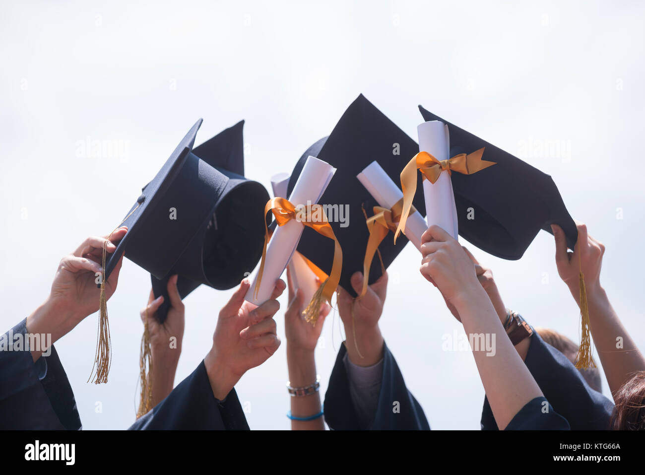 education, graduation and people concept - group of happy international ...