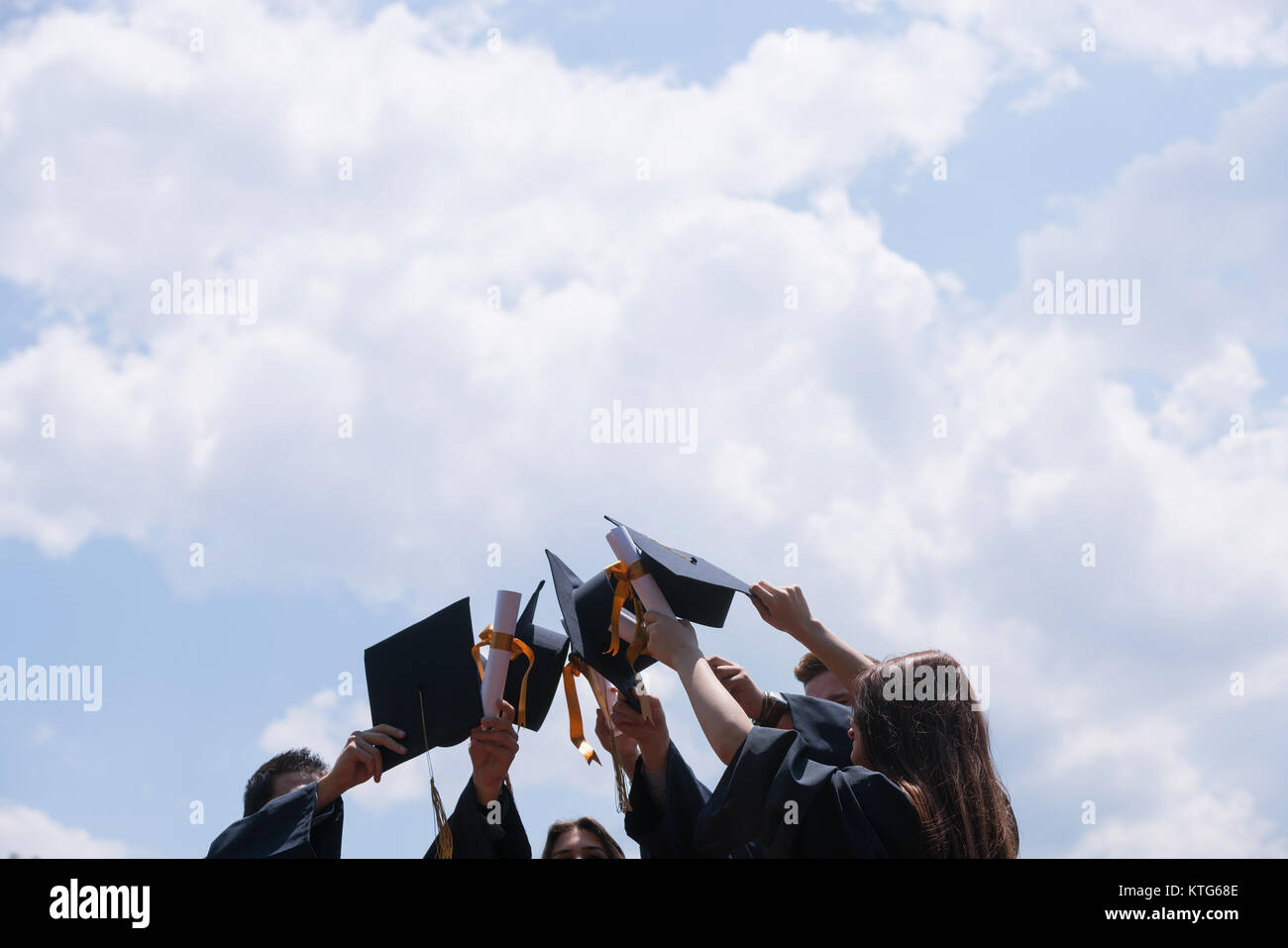 education, graduation and people concept - group of happy international ...