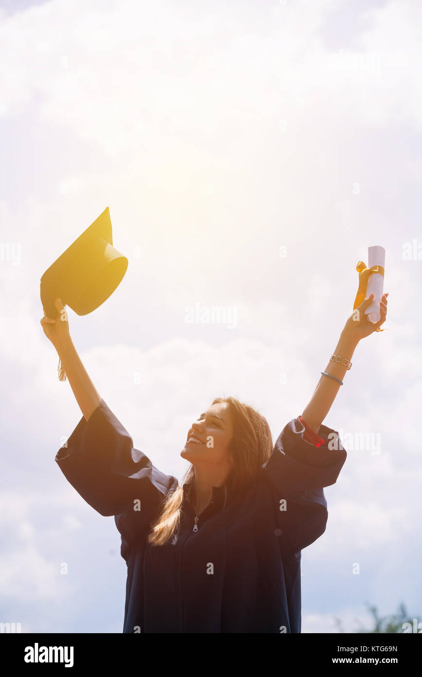 Happy woman on her graduation day University. Education and people ...