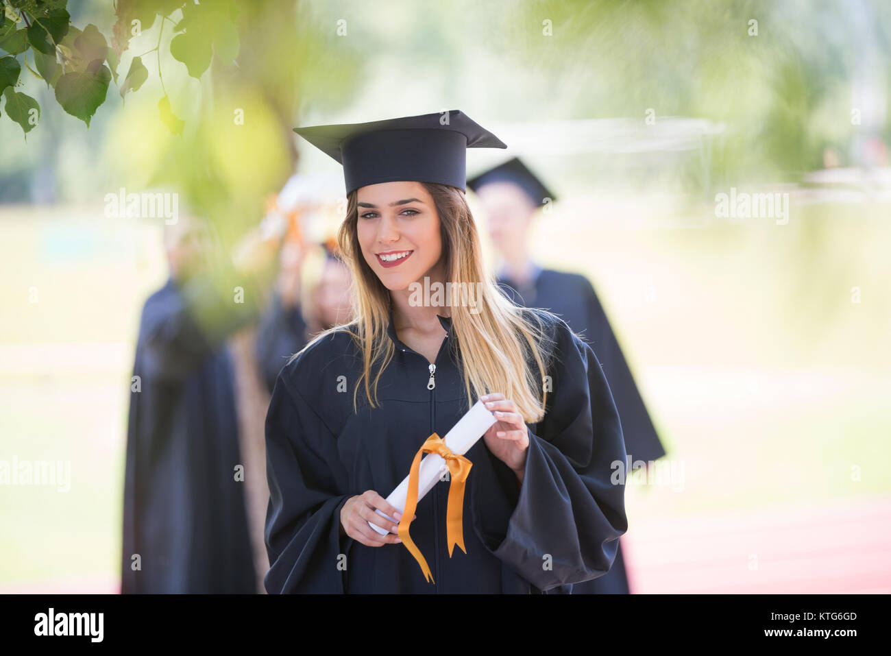 education, graduation and people concept - group of happy international ...