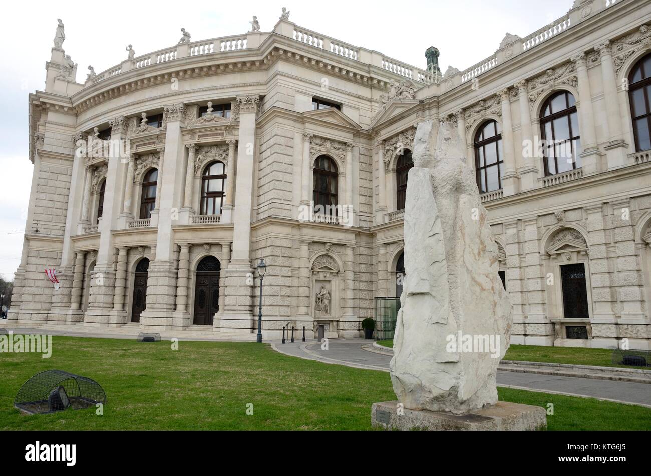 Modern stone sculpture on the grass around the Burgtheater, the ...