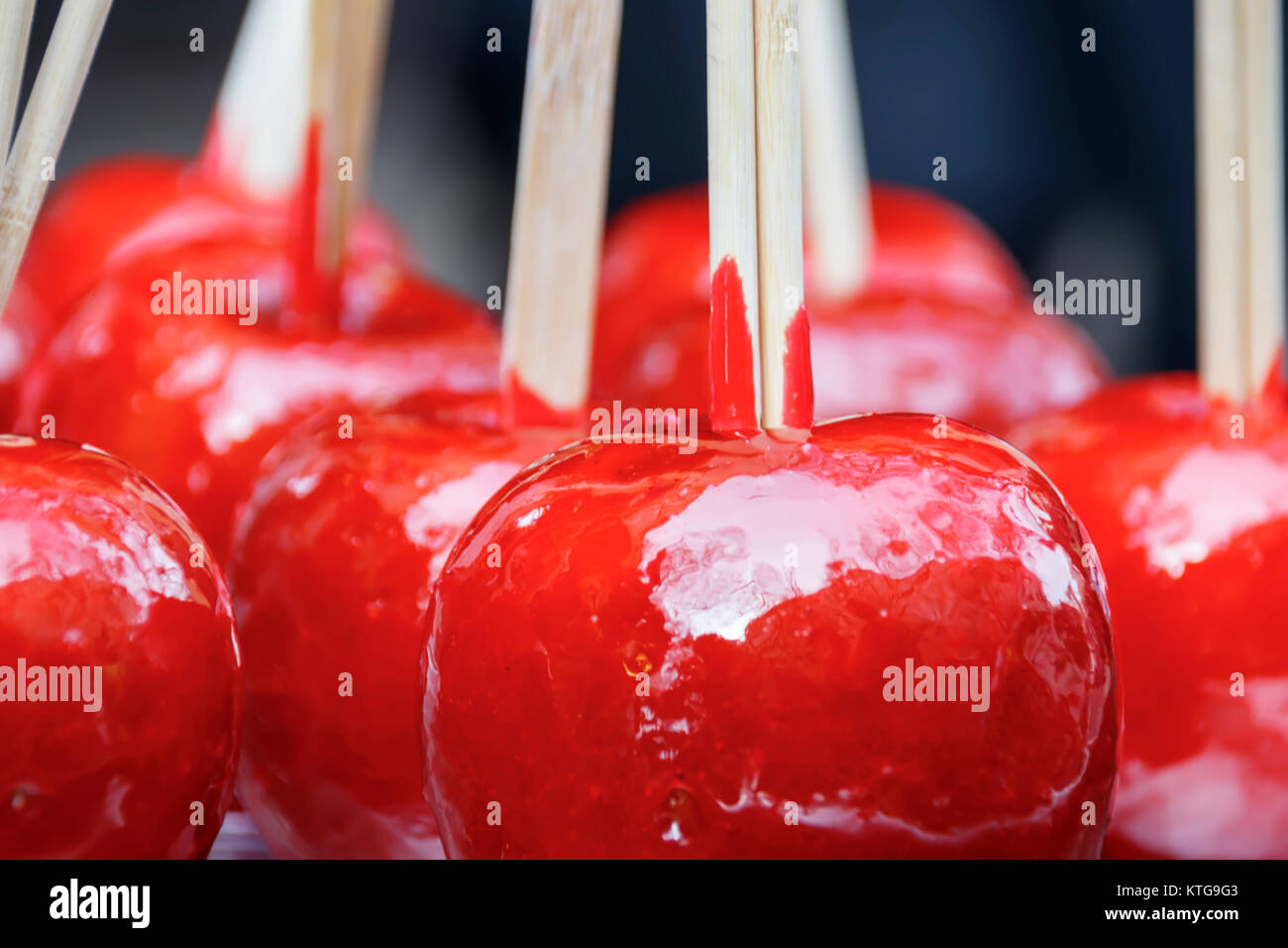 Red sugar apples on a stick. Eastern sweets, food Stock Photo - Alamy