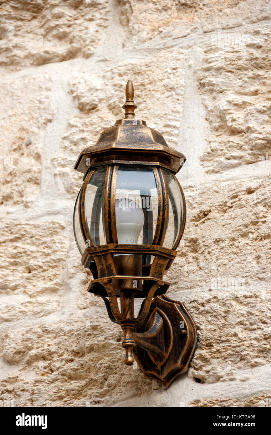 Street lamp on the wall of large blocks of Jerusalem stone Stock Photo ...