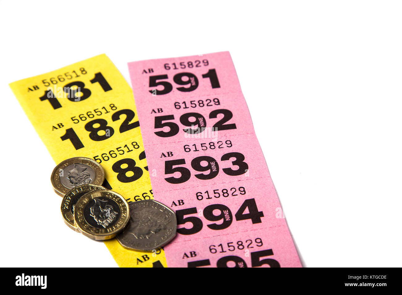 Yellow and Pink Raffle Tickets with UK Coins with negative space Stock ...