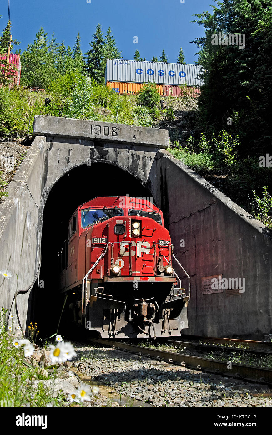 CP Intermodal train westbound led by loco 9112 exits Lower Spiral ...