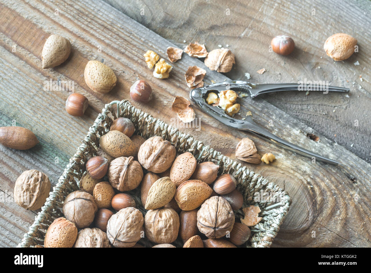 Assortment of nuts in the basket Stock Photo - Alamy