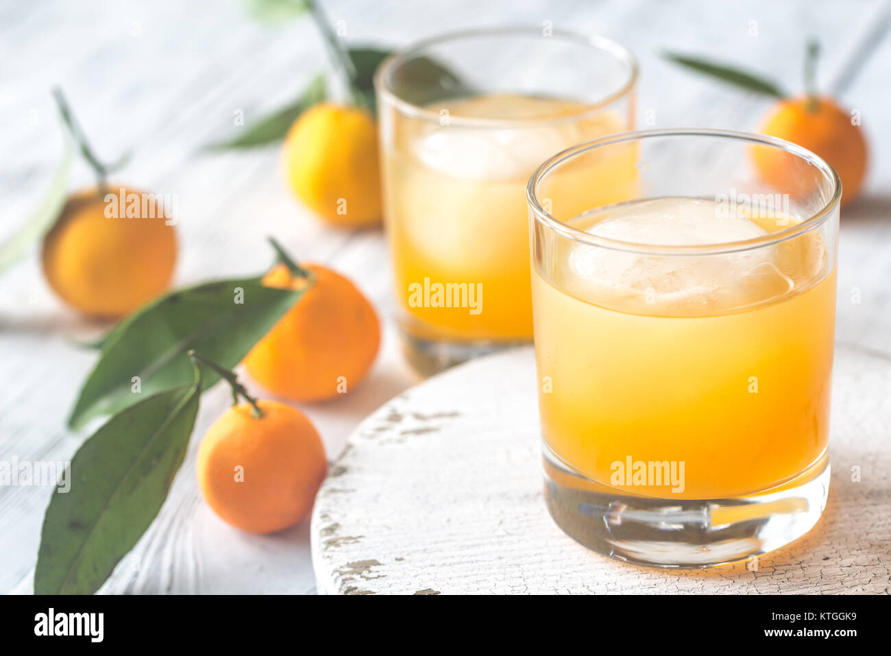 Two glasses of orange juice Stock Photo - Alamy