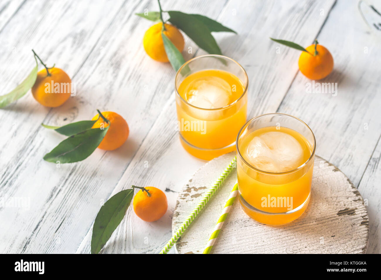 Two glasses of orange juice Stock Photo - Alamy