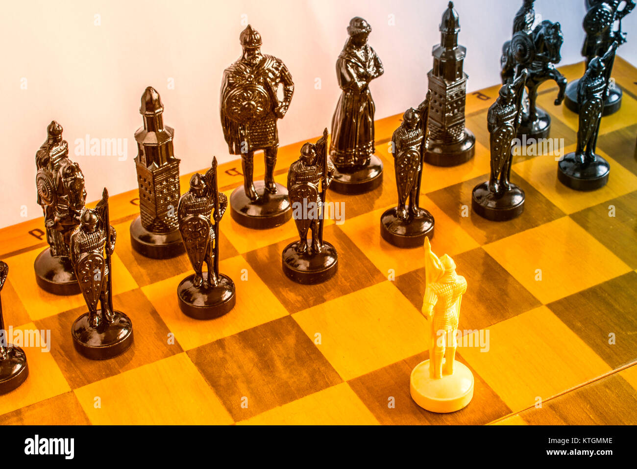 Chess on the board. The pawn is facing the enemy army Stock Photo - Alamy