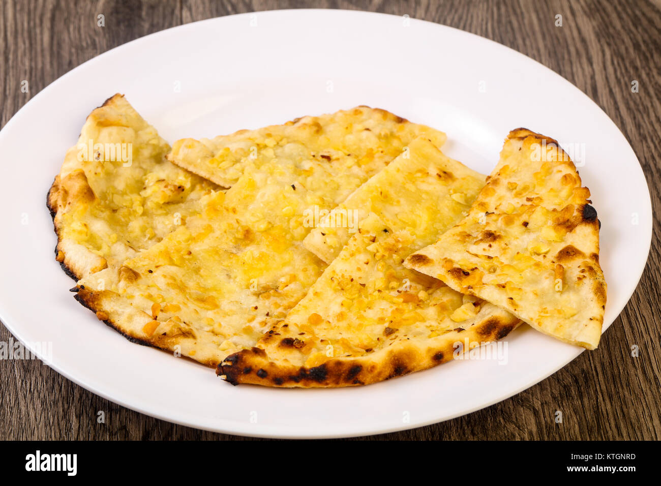Indian bread - Naan with cheese and garlic Stock Photo - Alamy