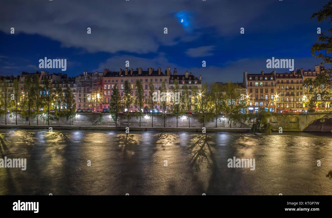Paris at night, river reflectons with moon sunlight Stock Photo - Alamy