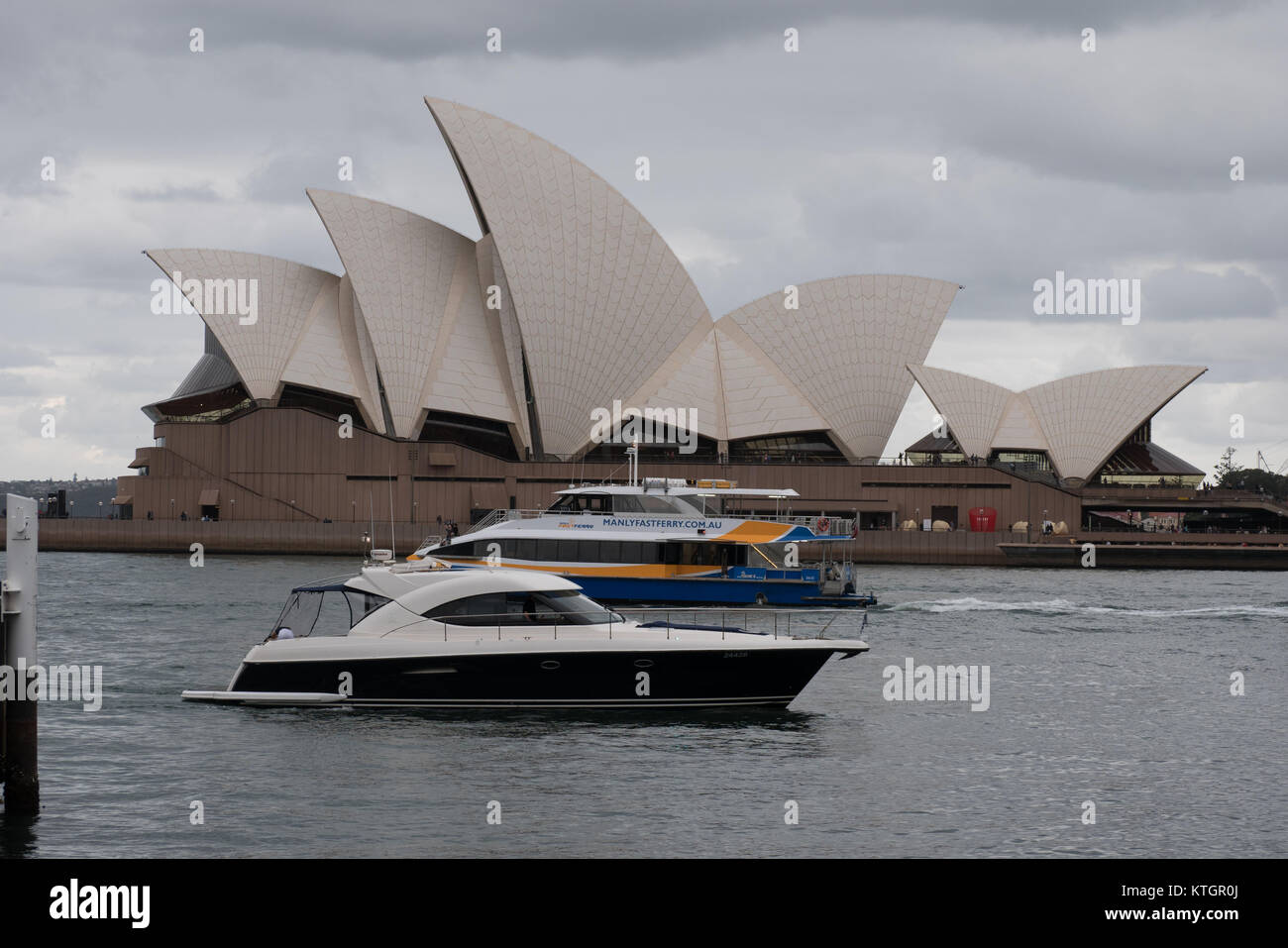 Sail boats in front of Sydney opera house Stock Photo - Alamy