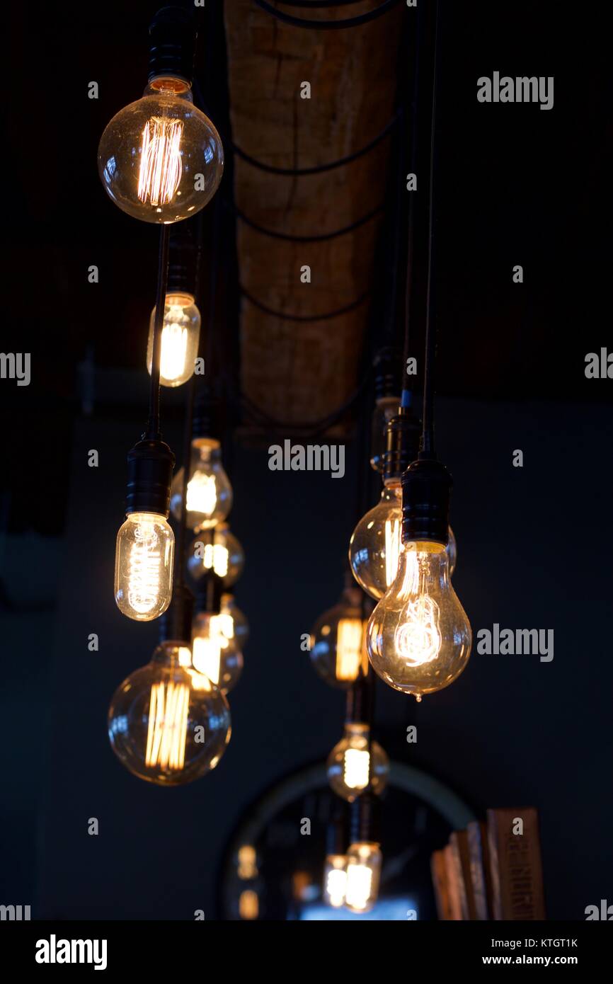 Interior depth of field vintage electric light bulbs in the foreground ...