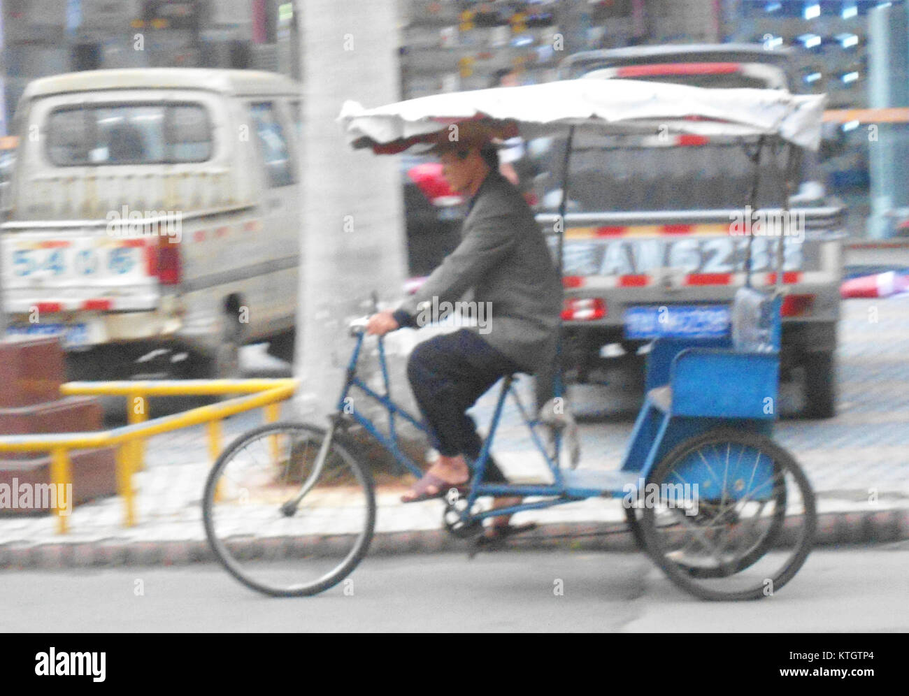 An auto rickshaw in Haikou, China, is a common mode of transport used ...