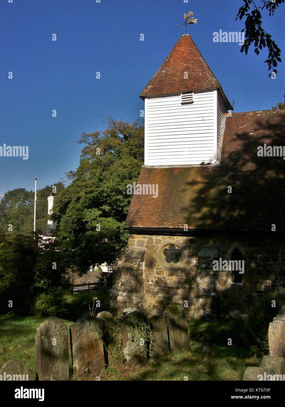 The bell tower of St. Martin’s Church in Ashurst, England, is a ...