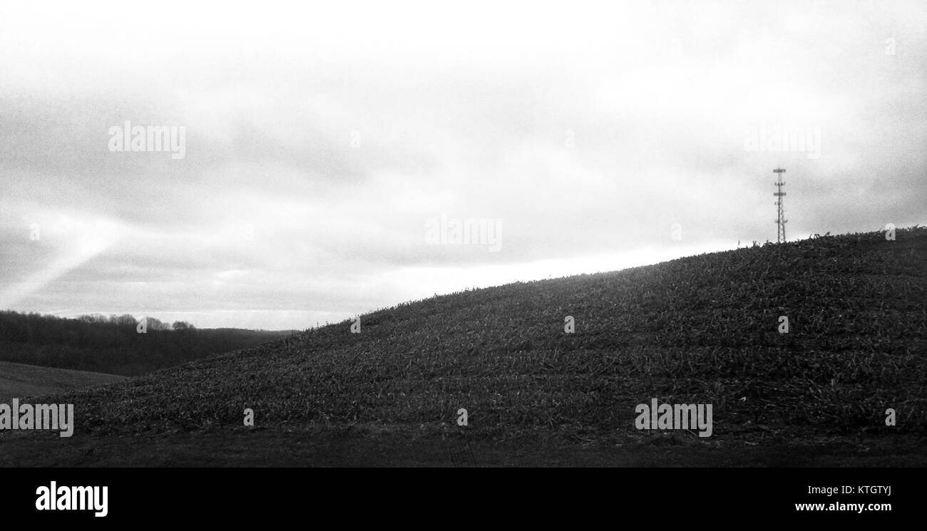 A photograph capturing the dramatic effect of a beam of sunlight ...