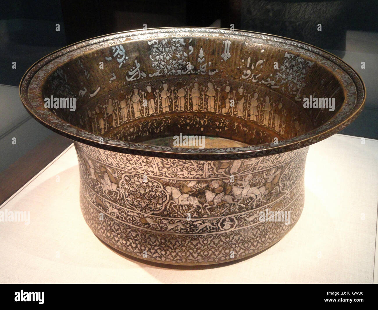 This brass basin, featuring Christian and Islamic motifs, dates to the ...
