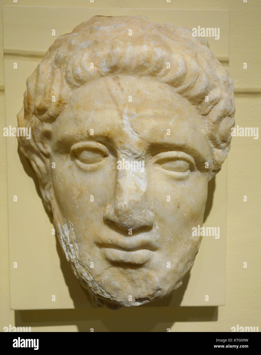 This Greek marble relief, dating back to 440 BC, depicts a bearded male ...