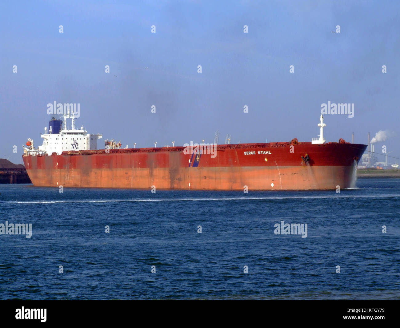 This image shows the *Berge Stahl* vessel in new colors at the Port of ...
