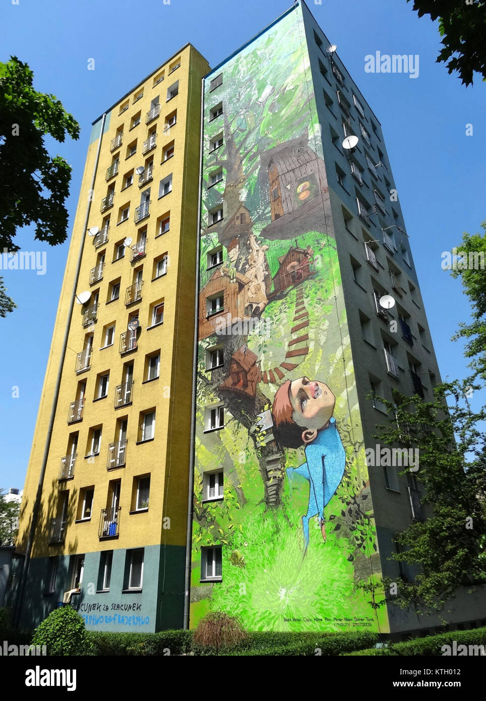 This mural, located at Moczynskiego Street 3 in Warsaw, Poland, was ...