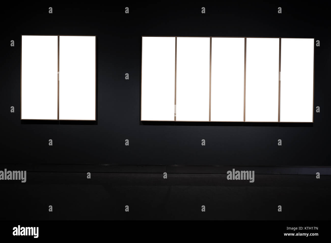 black wall with picture frames in long corridor Stock Photo - Alamy