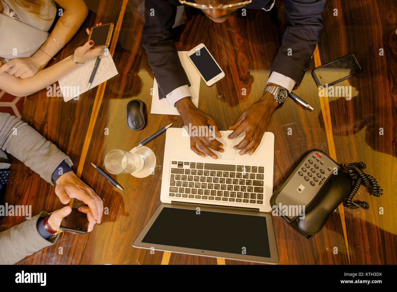 Business people meeting in office top view Stock Photo - Alamy