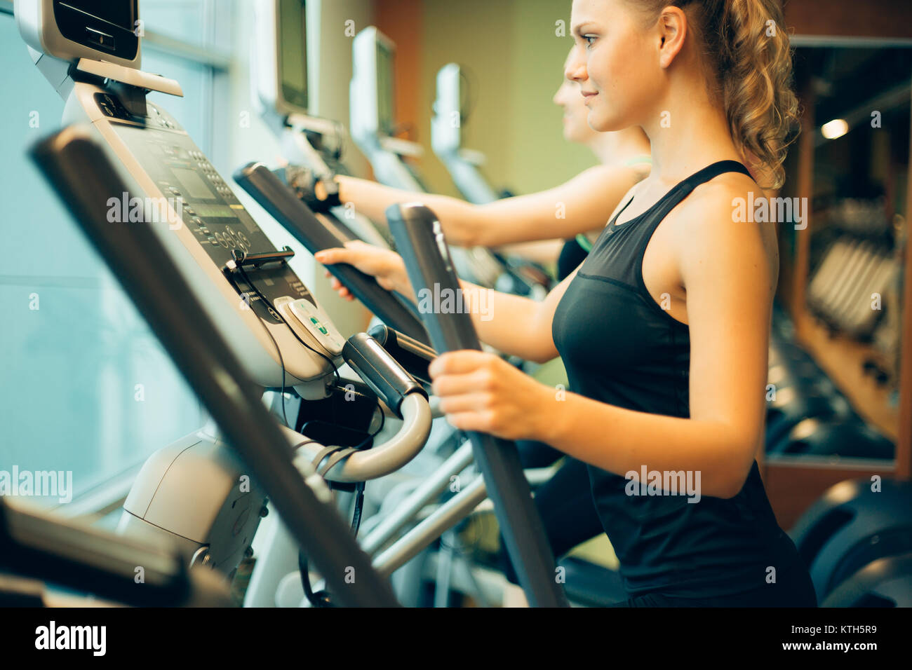 Group women exercise machines hi-res stock photography and images - Alamy