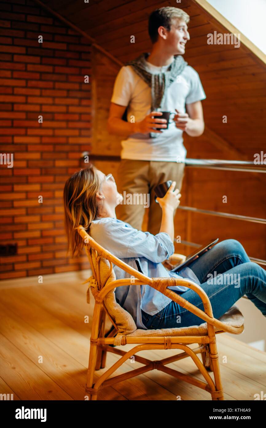couple talking about something while drinking coffee Stock Photo - Alamy