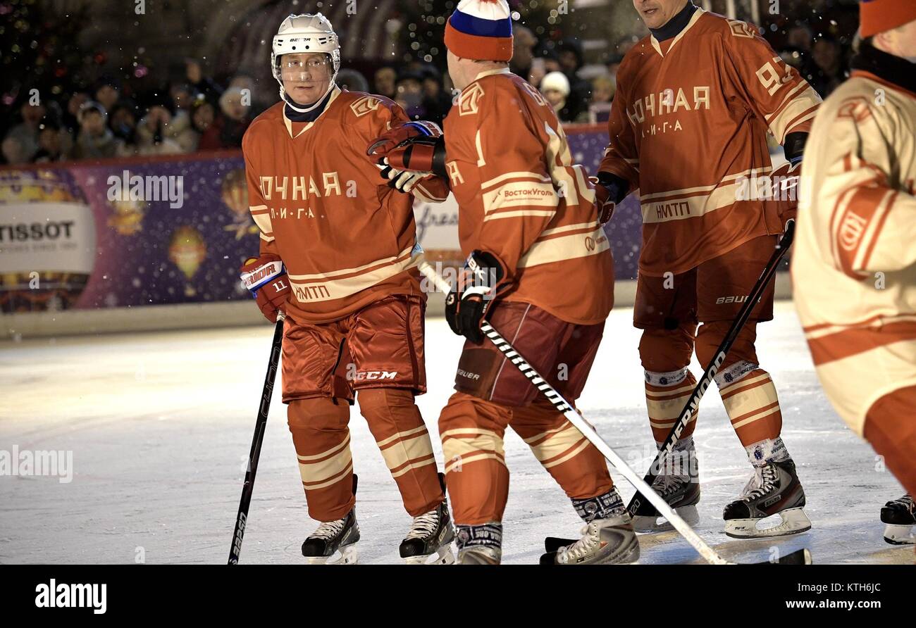 Russian President Vladimir Putin, center, plays in a friendly Night Ice ...