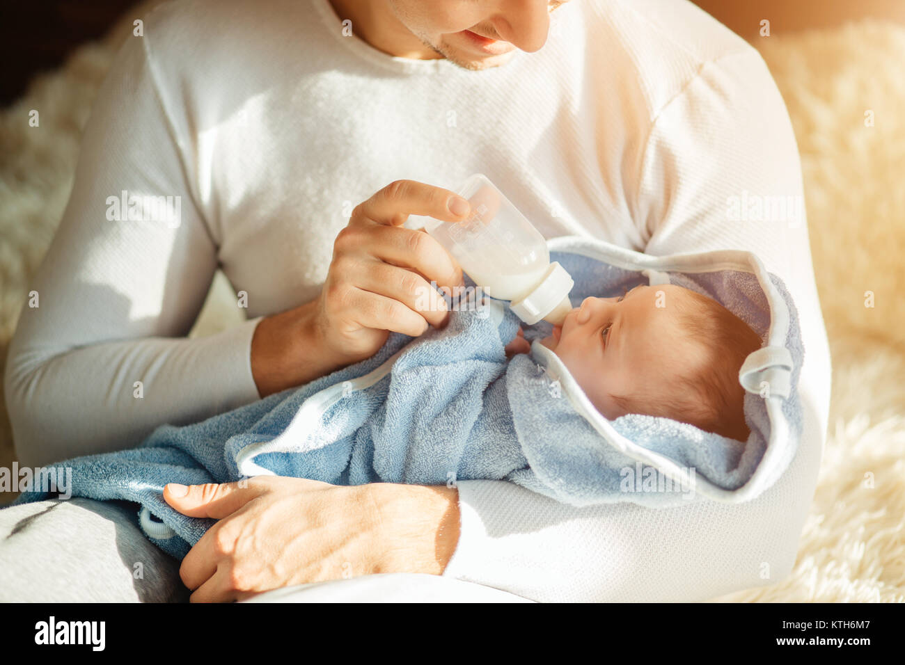 Father Feeding Newborn Baby At Home Stock Photo - Alamy