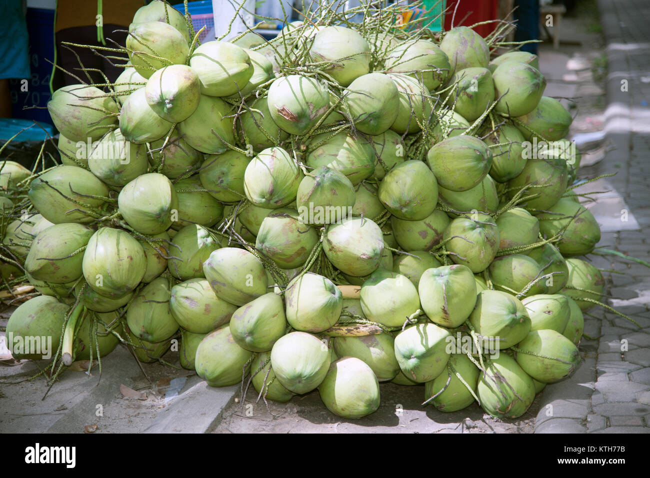 Group of Coconut on a floor for sell. Suitable for use as wallpapers ...