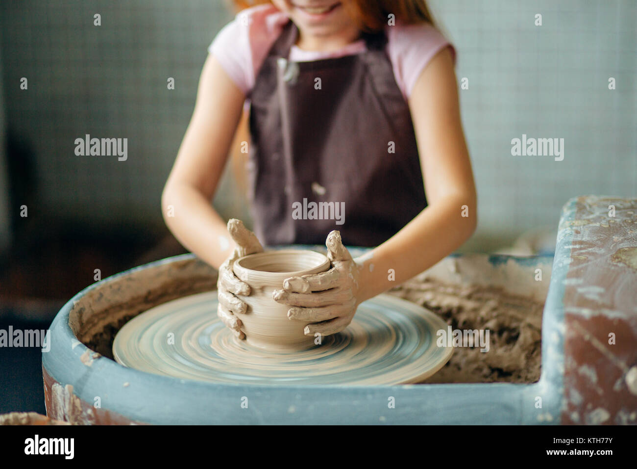 Hands of young potter, close up hands made cup on pottery wheel Stock ...