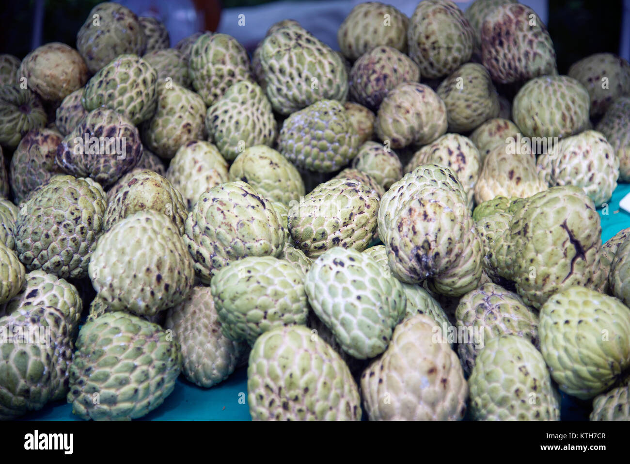 Sugar-apple fruit (Annona squamosa) on table for sell in market of the ...